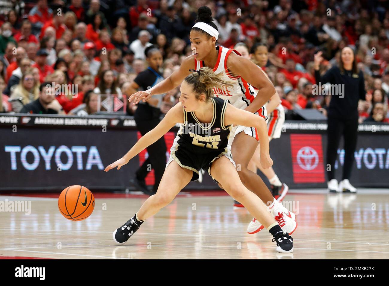 Purdue guard Abbey Ellis, left, reaches for the ball in front of Ohio ...