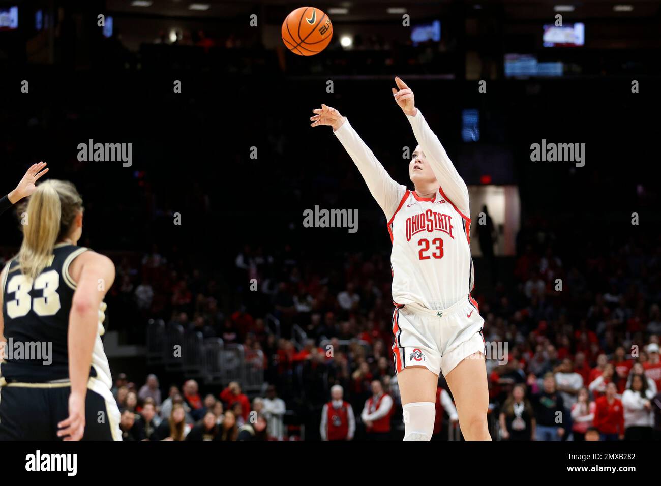 Ohio State forward Rebeka Mikulasikova, right, shoots in front of ...