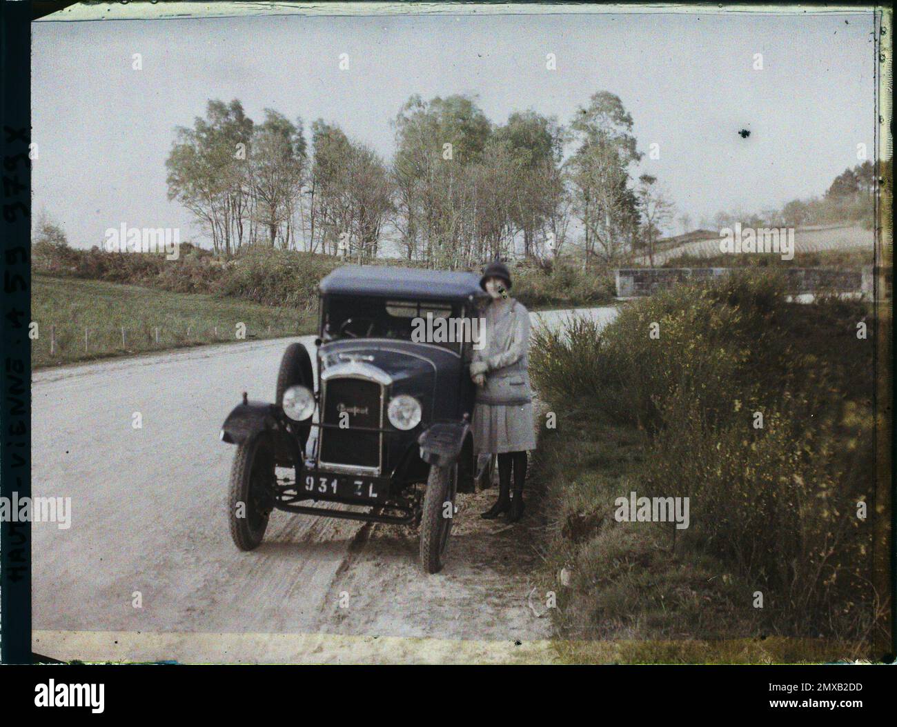 Saint-Germain-les-Belles, France Madame Misme poses next to her car, a ...
