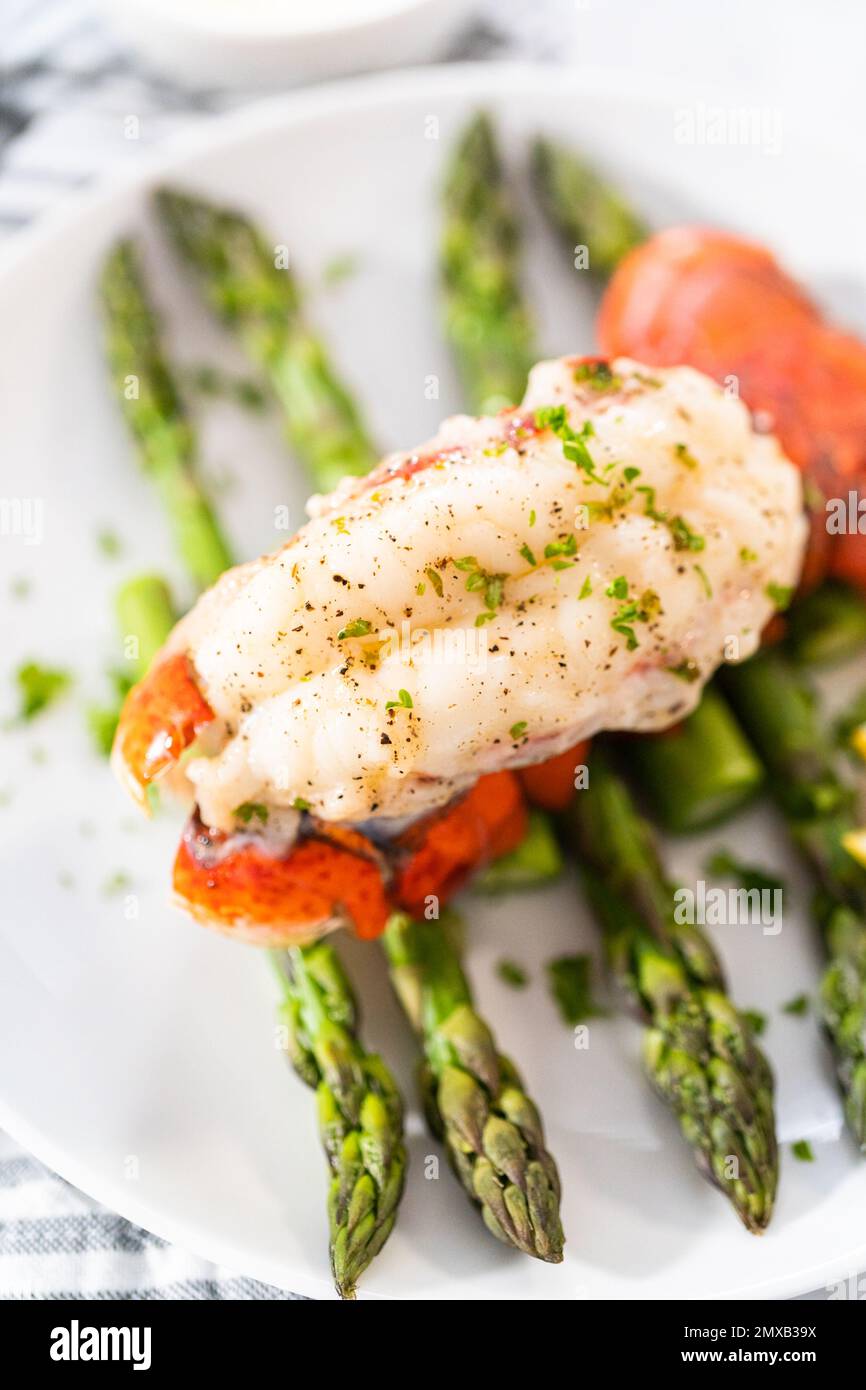 Garlic lobster tails Stock Photo - Alamy