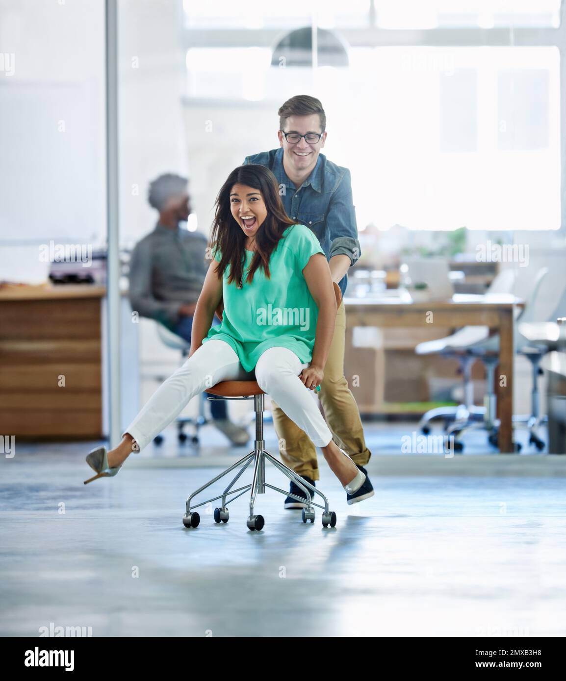 One, two, three..GO. a male coworker pushing his female coworker around ...