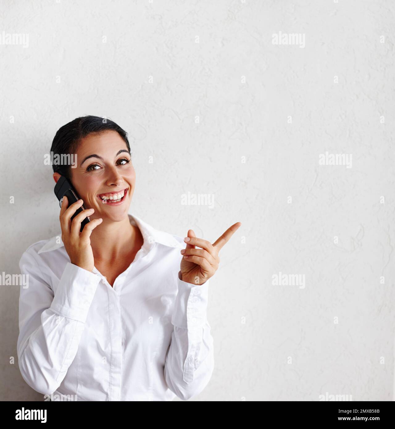 Pointing at the phone hi-res stock photography and images - Alamy