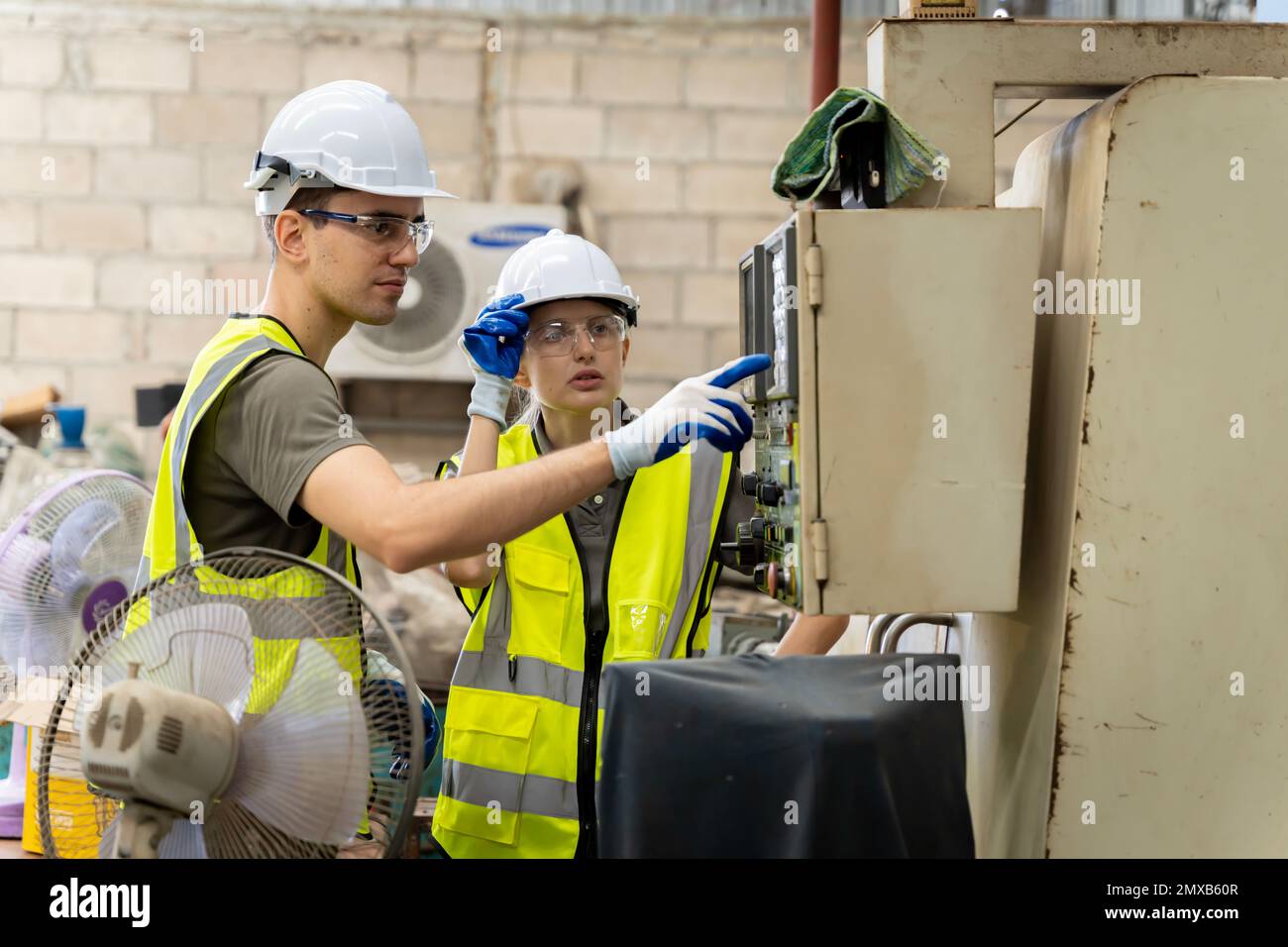 Team of engineers practicing maintenance Taking care and practicing ...