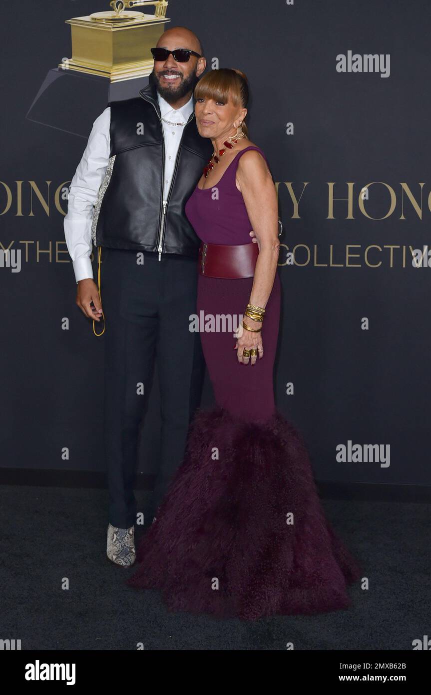 Swizz Beatz, left, and Epic Records CEO Sylvia Rhone arrive at the ...