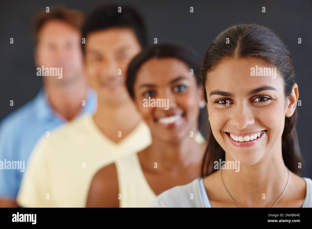 A rising star. Portrait of an attractive young woman standing in line ...