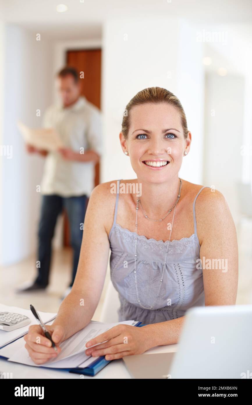 Working hard starts with a positive mindset. an attractive woman smiling happily at the camera ...
