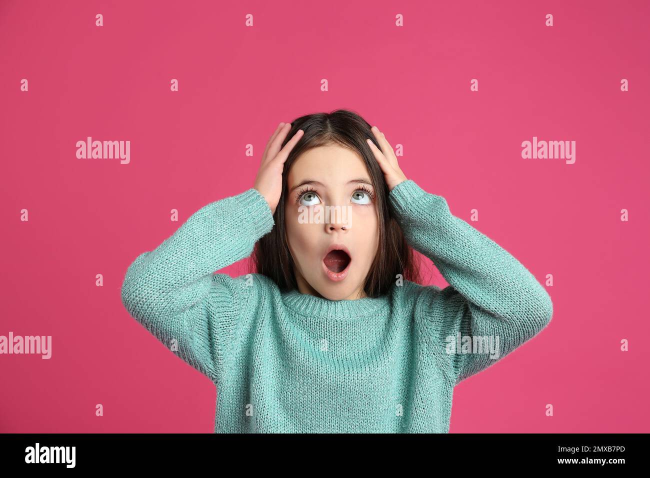 Portrait of cute little girl on pink background Stock Photo - Alamy