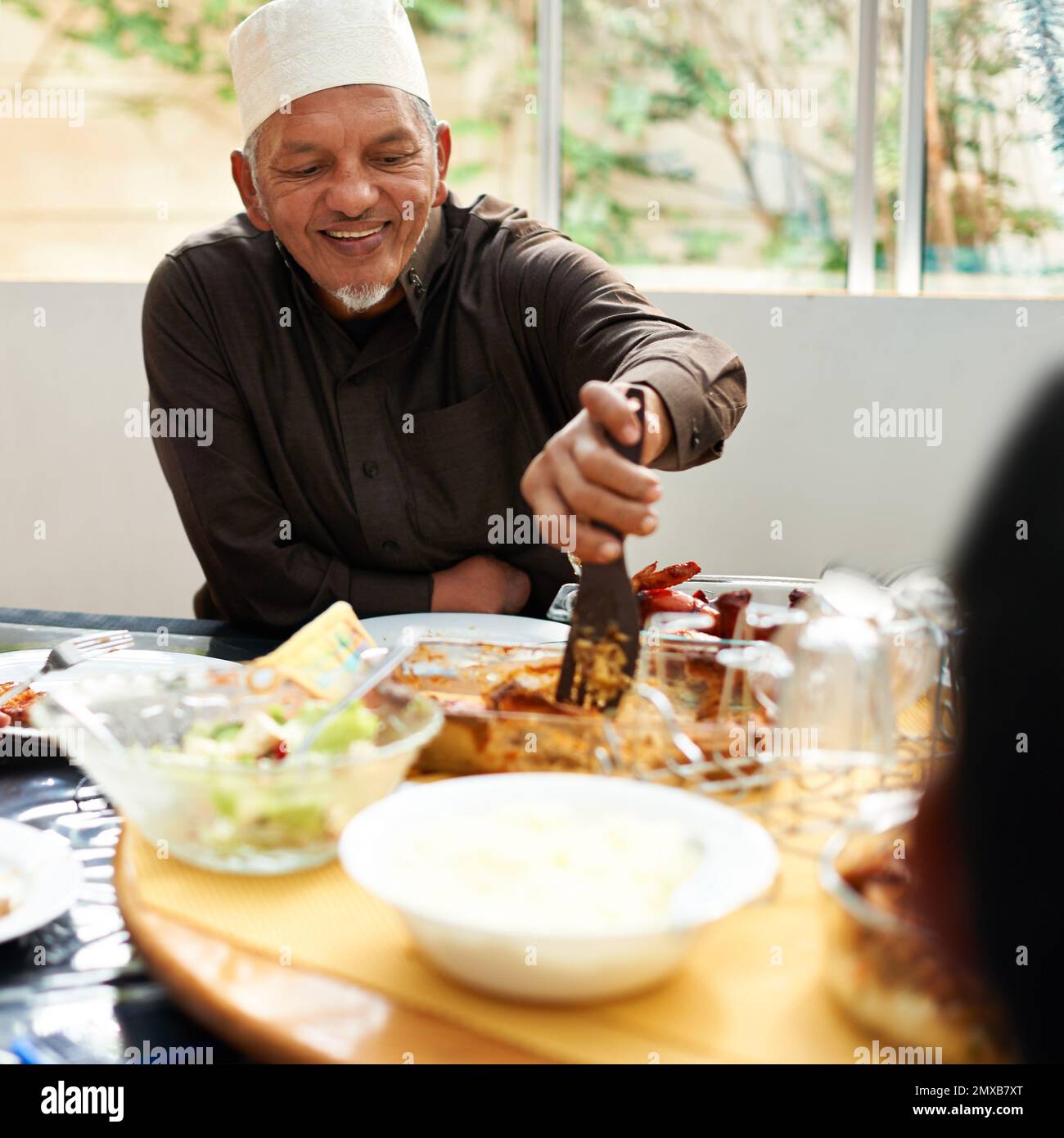 Indian family eating a feast hi-res stock photography and images - Alamy