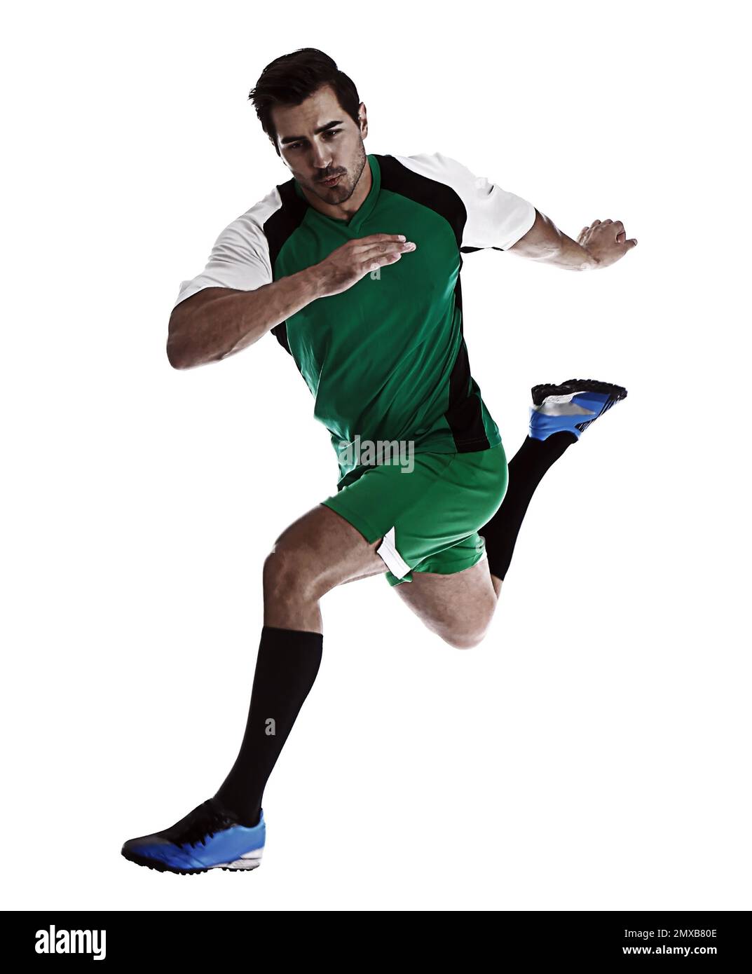 Young man playing football on white background Stock Photo - Alamy