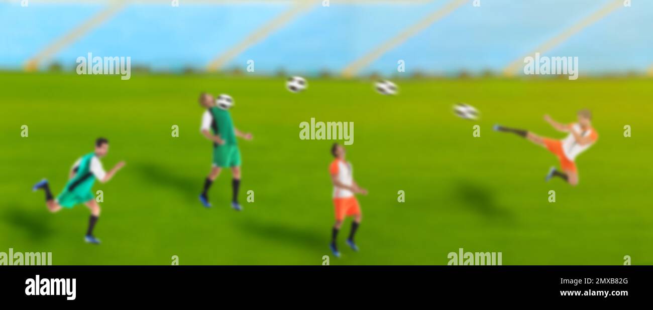 Blurred view of men playing football at stadium, banner design. Soccer ...