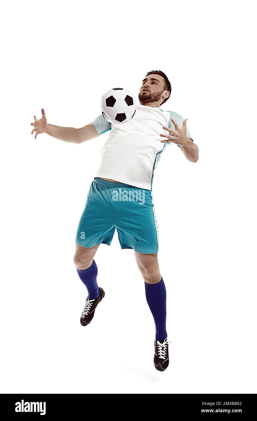 Young man playing football on white background Stock Photo - Alamy