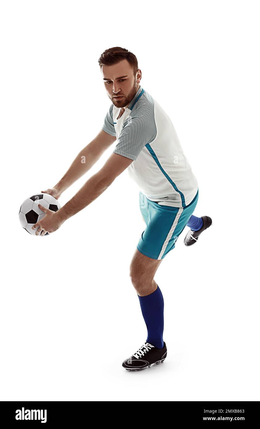 Young man playing football on white background Stock Photo - Alamy