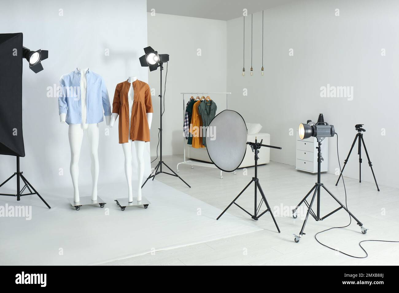Ghost mannequins with modern clothes in professional photo studio Stock ...