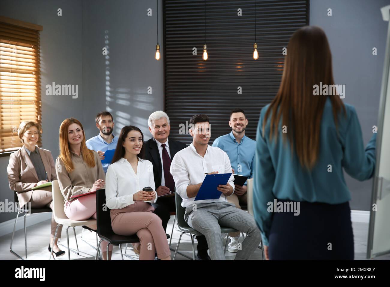Audience answering questions speaker hi-res stock photography and ...