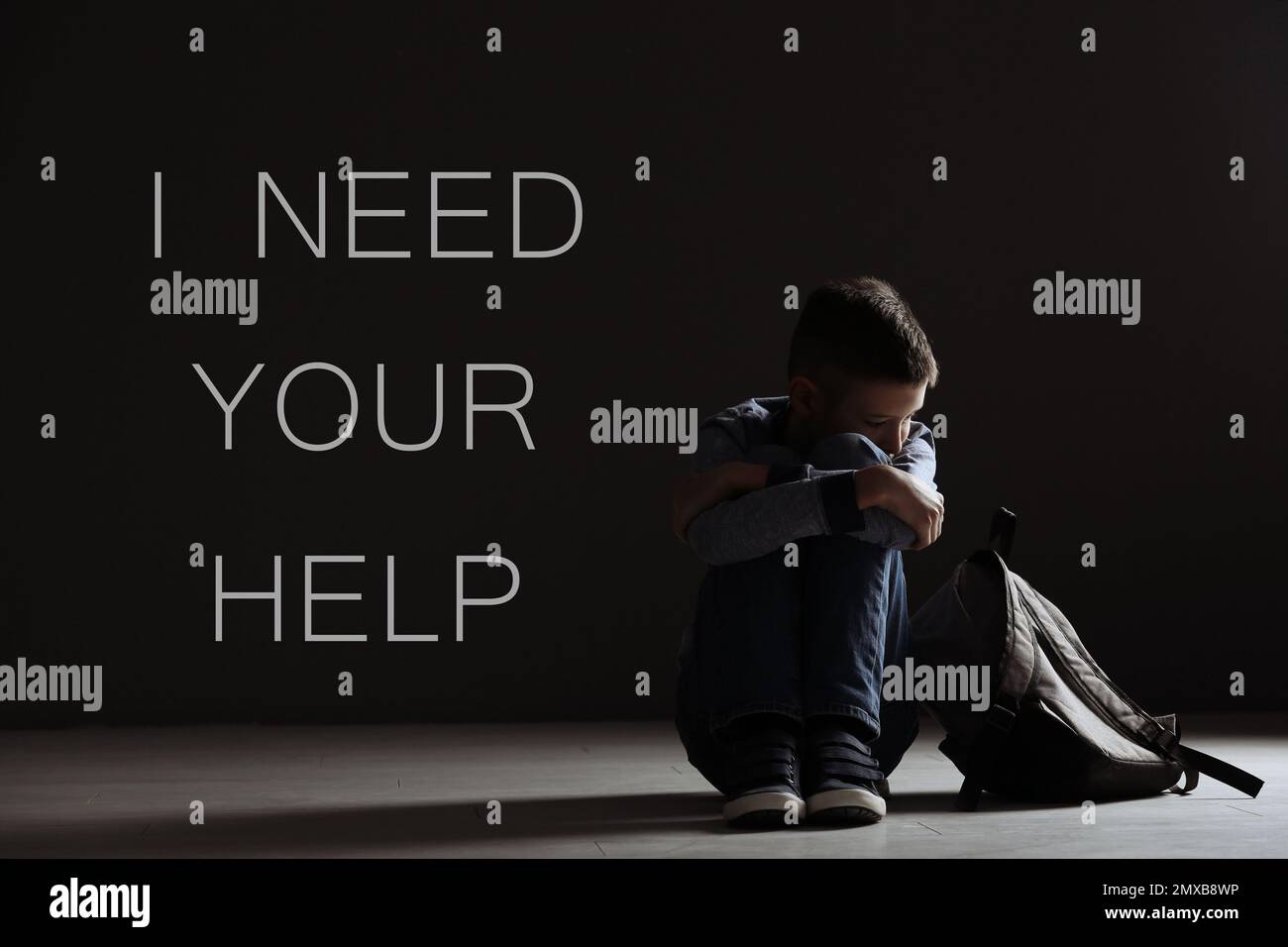 Unhappy child dark room hi-res stock photography and images - Alamy