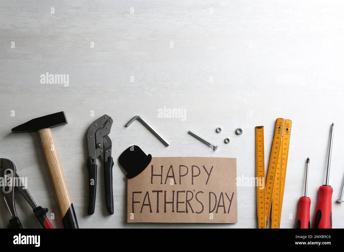 Card with words HAPPY FATHER'S DAY and tools on white background, flat ...