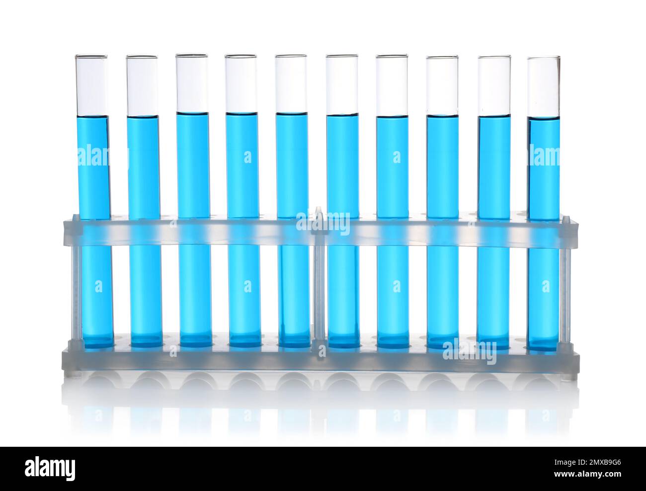 Test tubes with blue samples on white background Stock Photo - Alamy