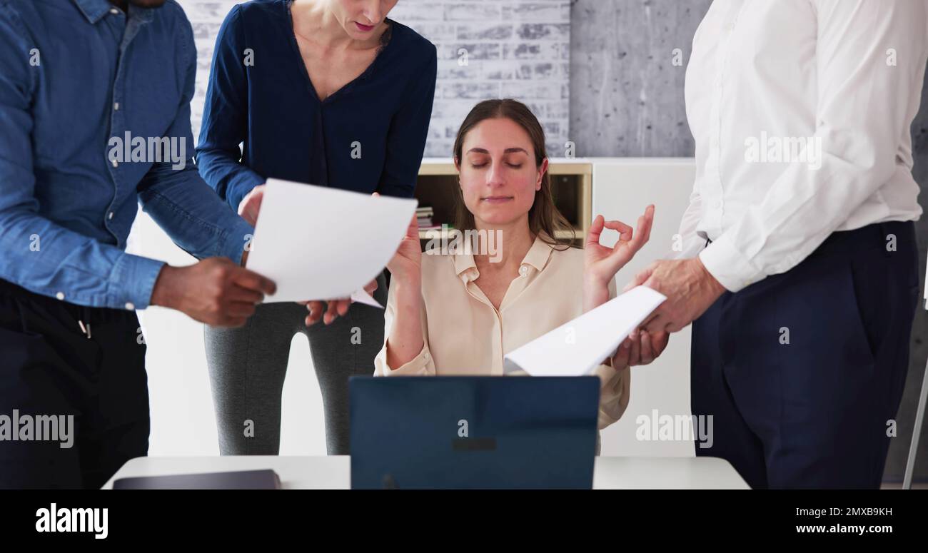 Workplace Stress Management In Office. Diverse Group Stock Photo - Alamy