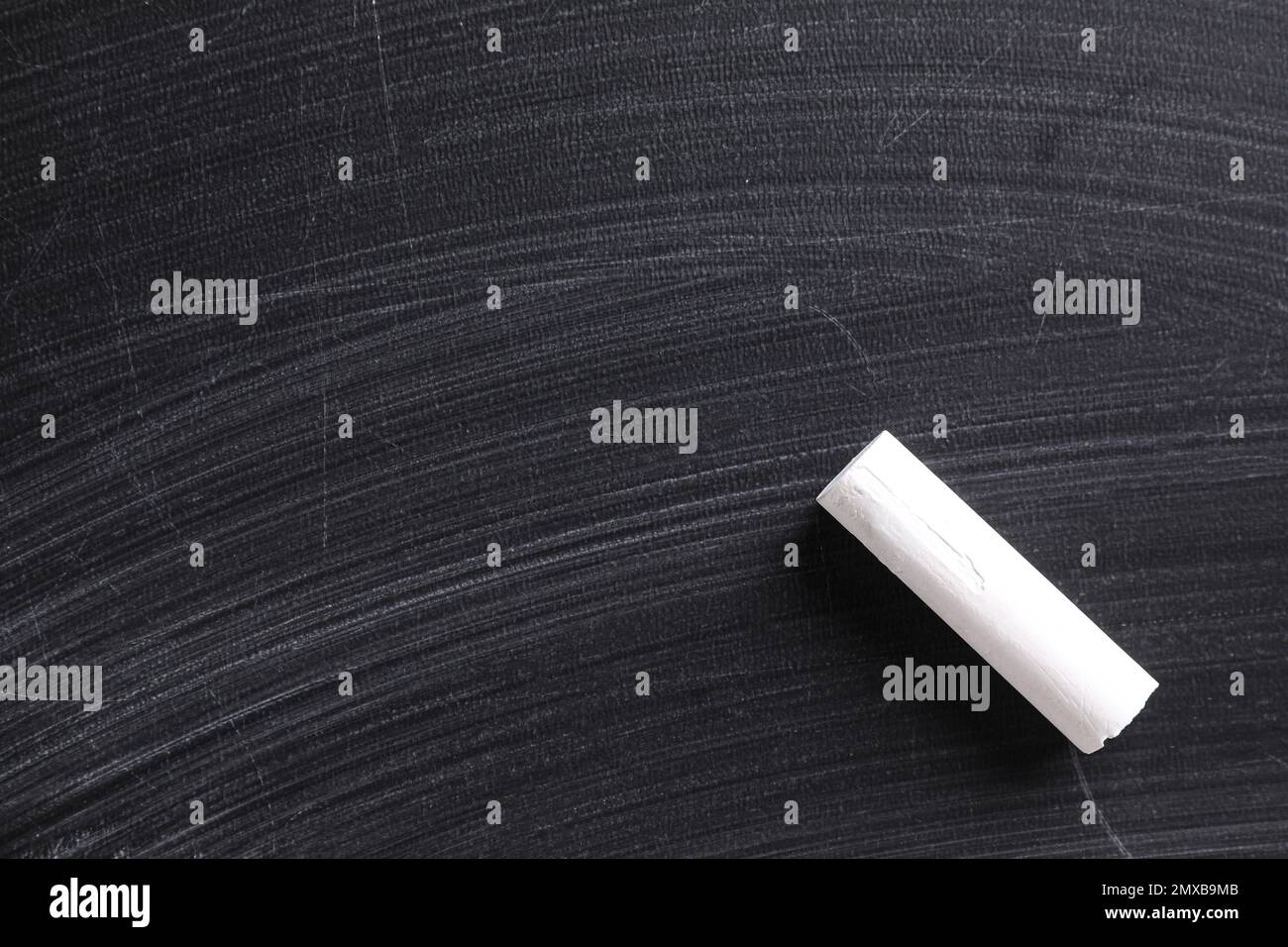 Piece of white chalk on blackboard, top view. Space for text Stock ...