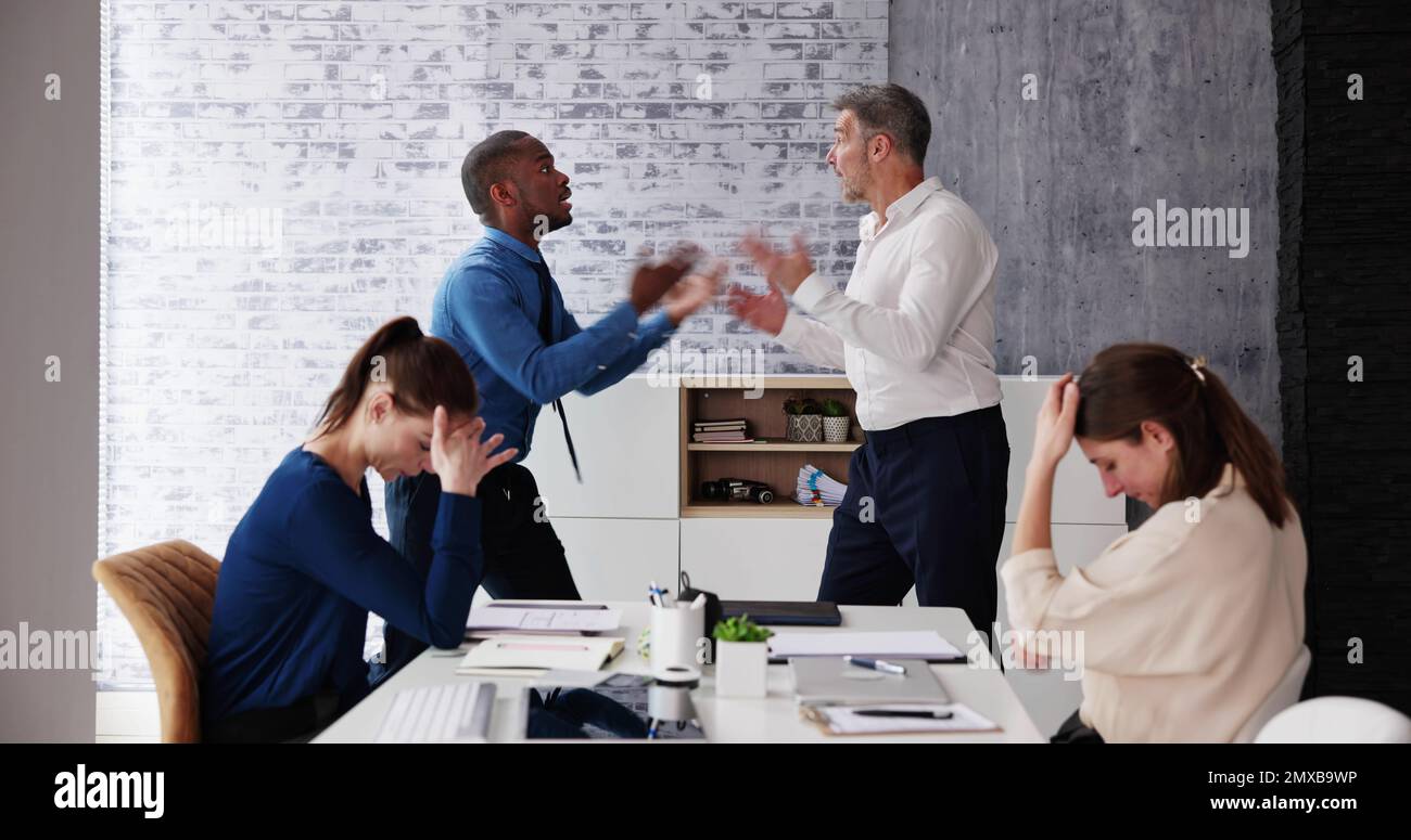 Angry Dominant Colleague Fighting And Bullying At Workplace Stock Photo ...