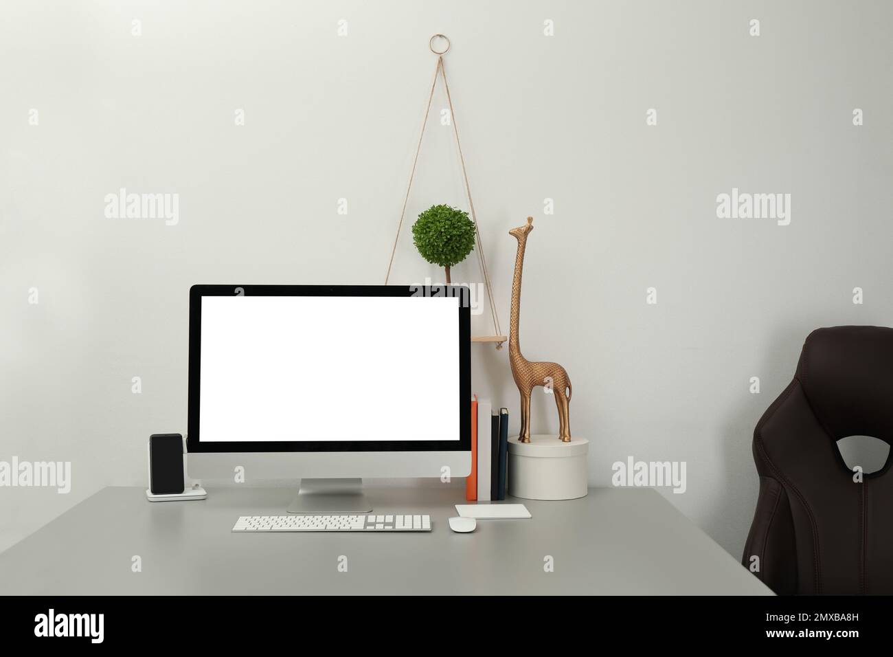 Modern workplace with computer and decor elements. Interior design ...