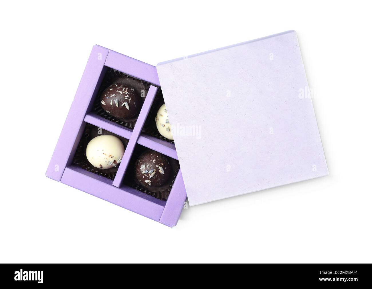 Box with tasty chocolate candies isolated on white, top view Stock ...