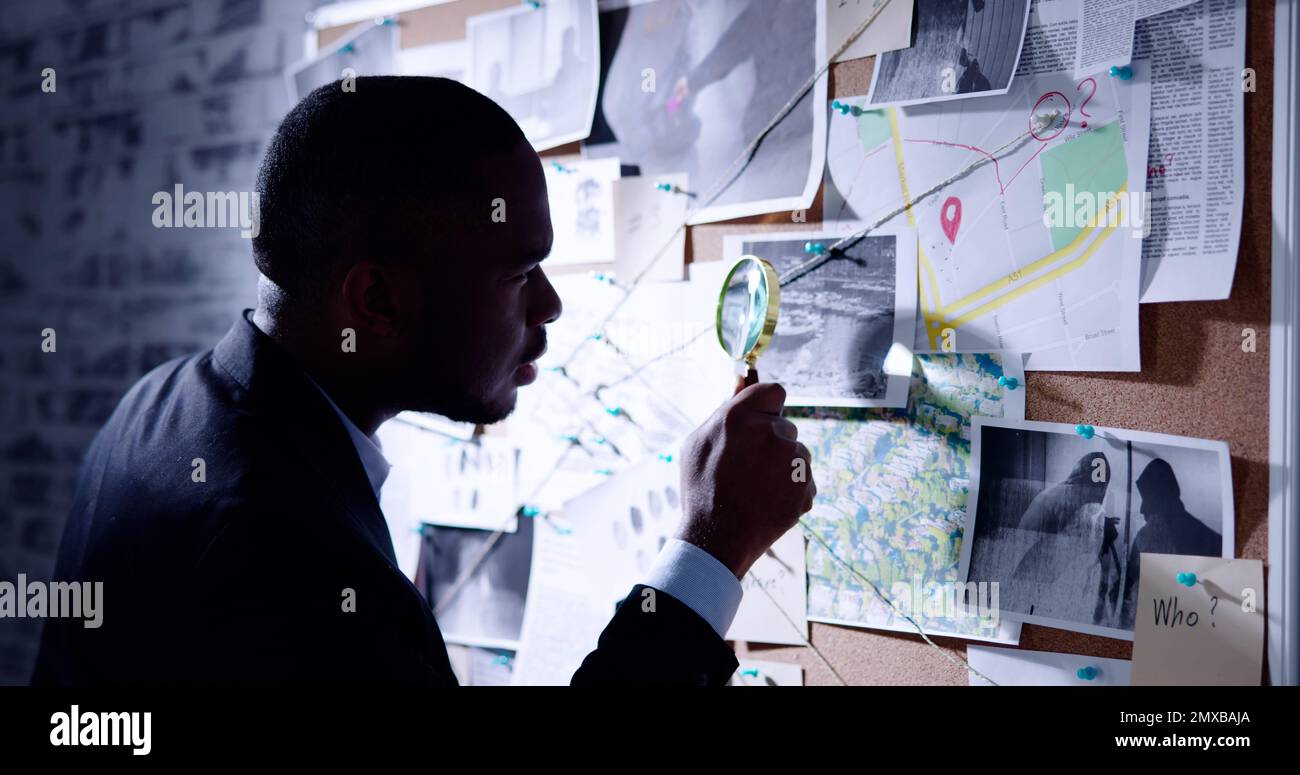 Police Inspection Looking For Clues On Investigation Board Stock Photo ...