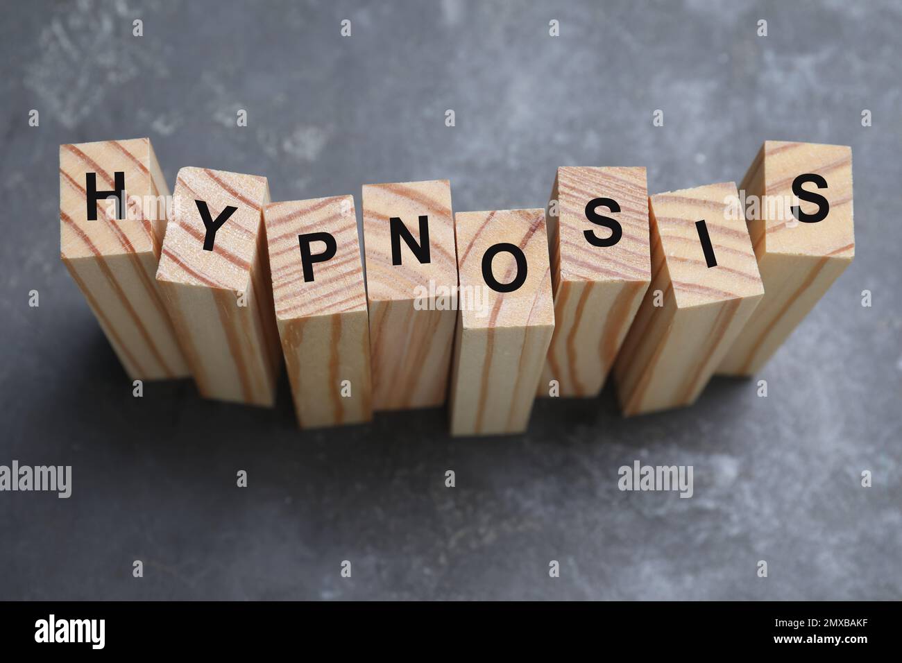 Wooden blocks with word HYPNOSIS on grey background, above view Stock ...
