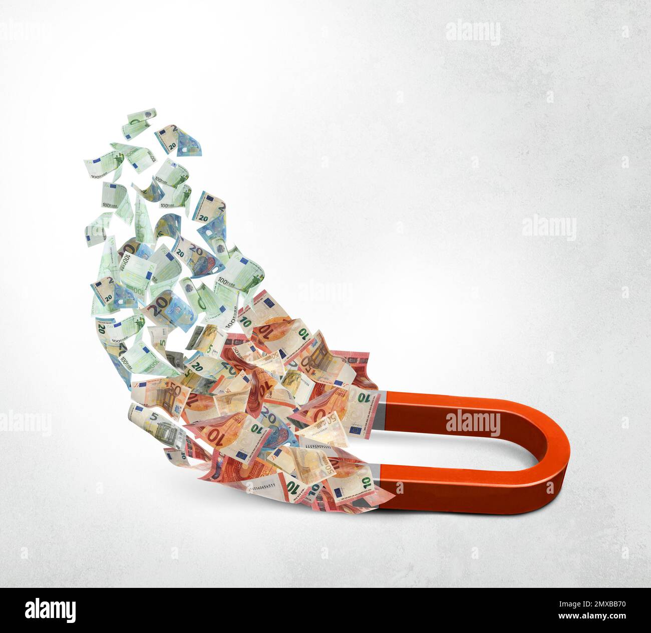 Magnet pulling money hi-res stock photography and images - Alamy
