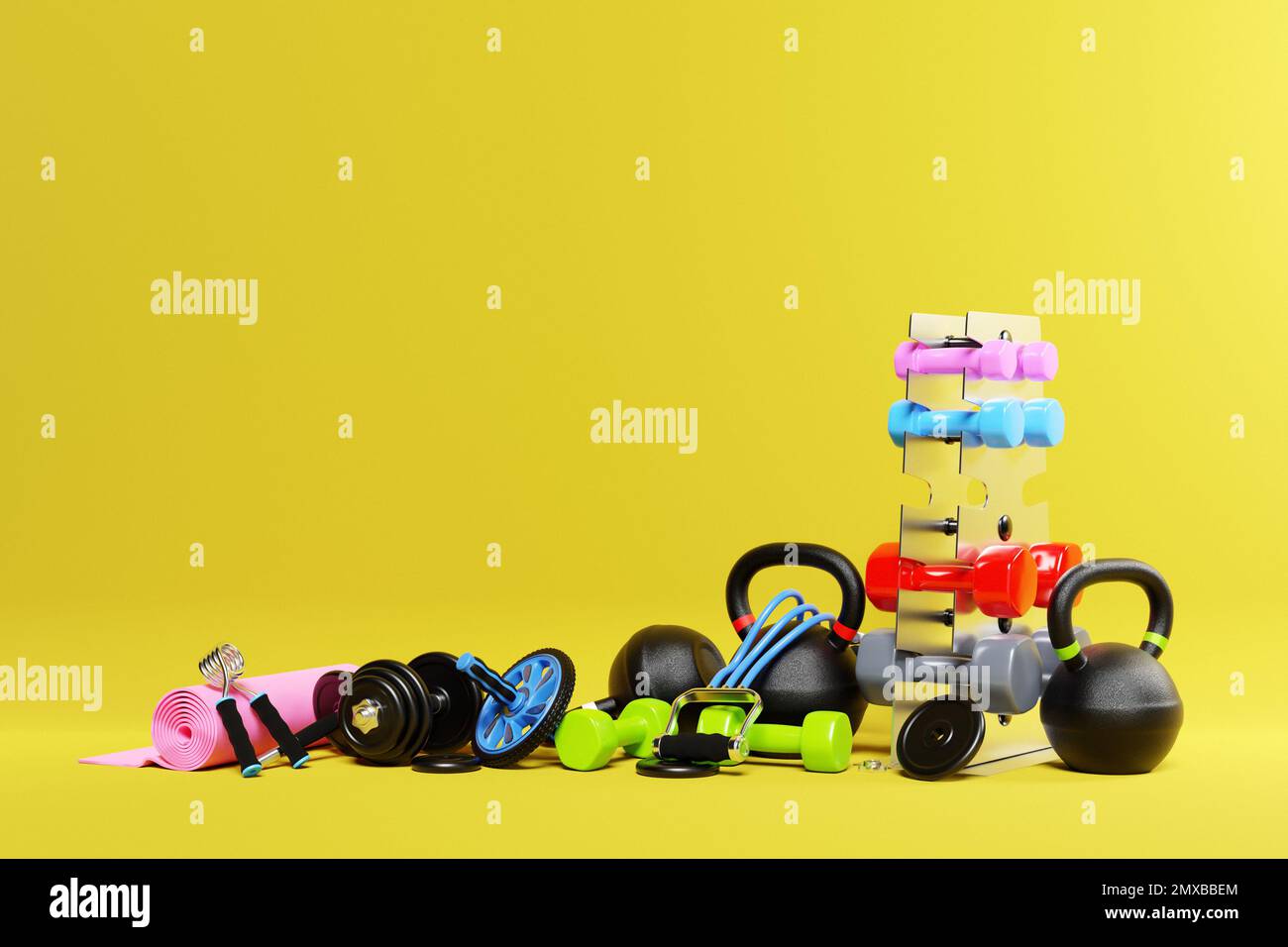 Bunch of fitness training weights on yellow background. Colorful ...