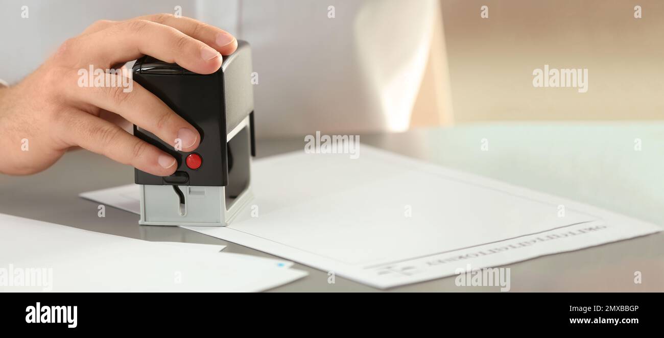Notary stamping document at table, space for text. Banner design Stock ...