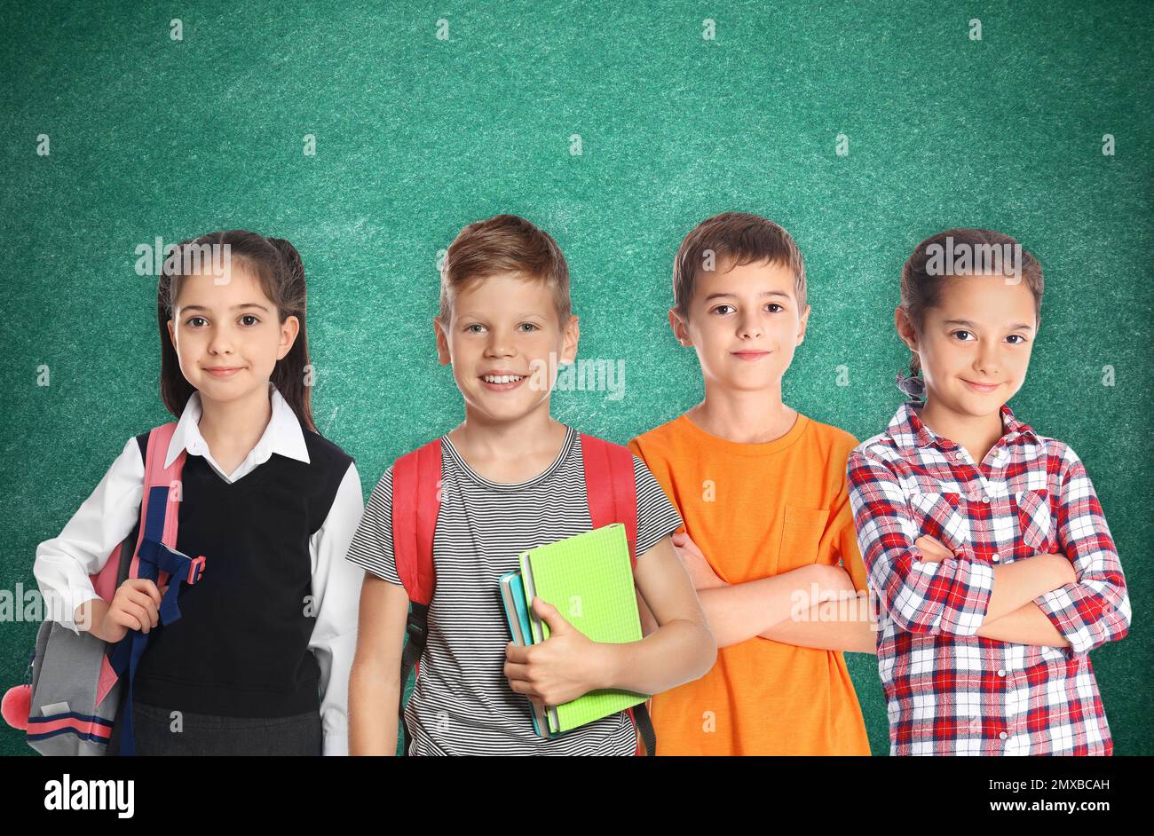 Group of cute school children and chalkboard on background Stock Photo ...
