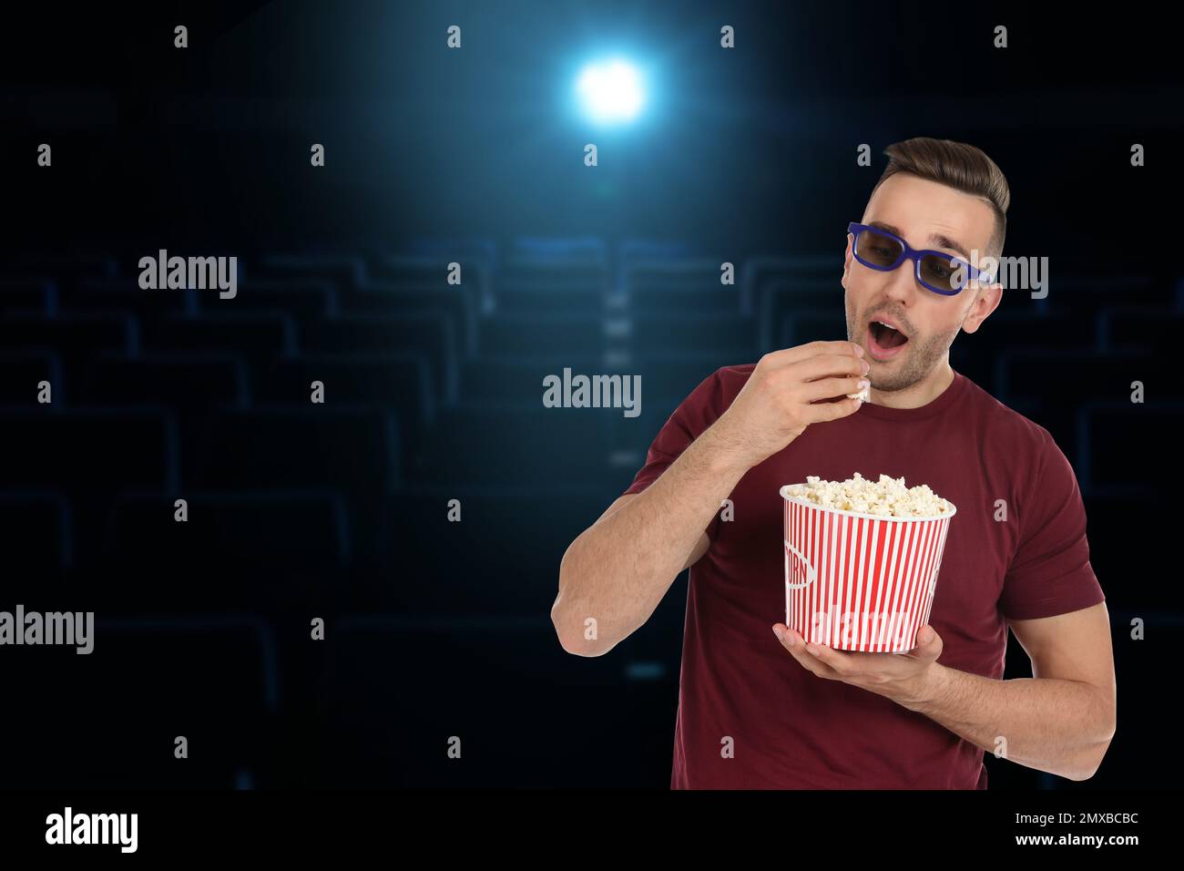 Man in cinema seat hi-res stock photography and images - Alamy