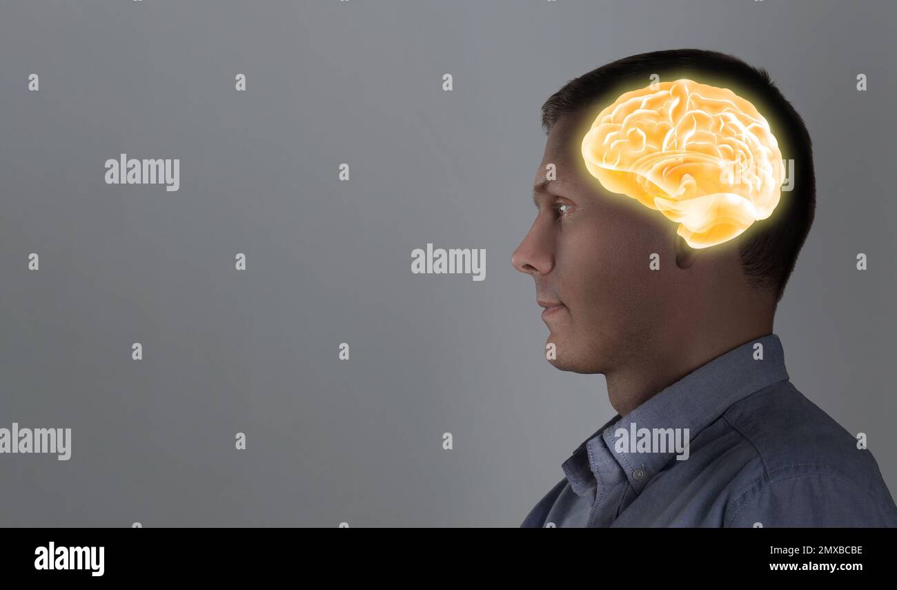 Thinking concept, space for text. Man and illustrated brain on grey ...