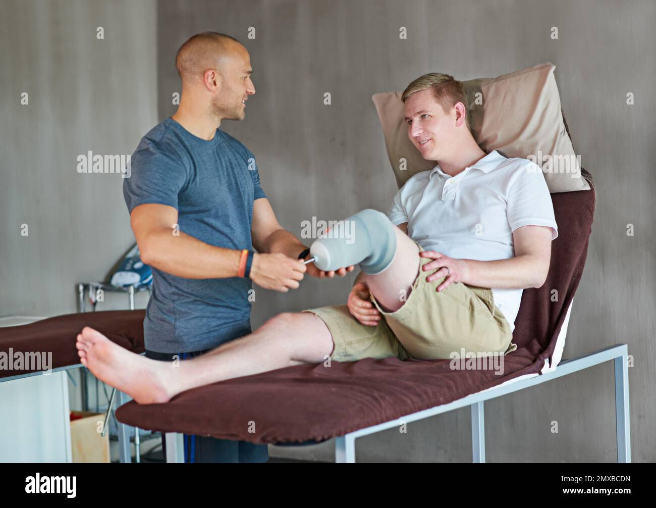 Youre progressing well. Studio shot of a young amputee training in a ...