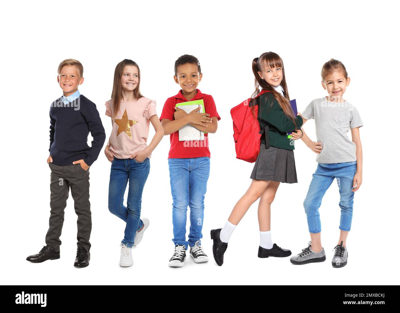 Group of cute school children on white background Stock Photo - Alamy