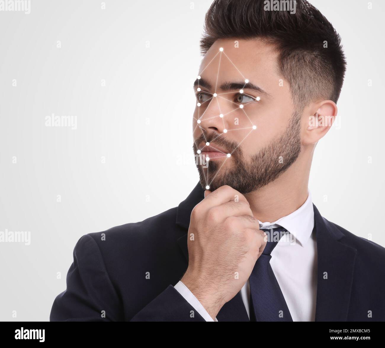 Facial recognition system. Businessman with digital biometric grid on ...