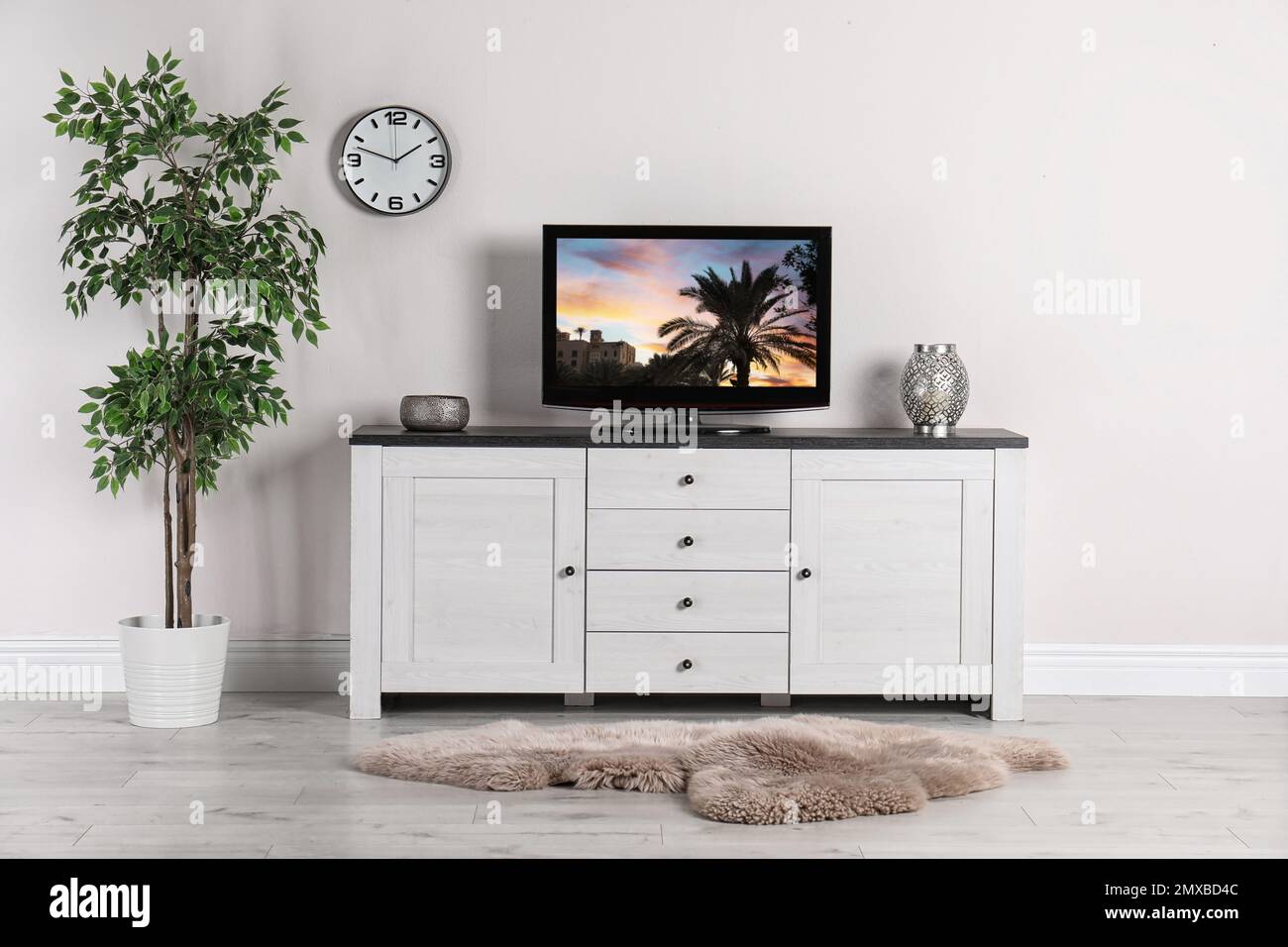 Modern TV set in living room interior Stock Photo - Alamy