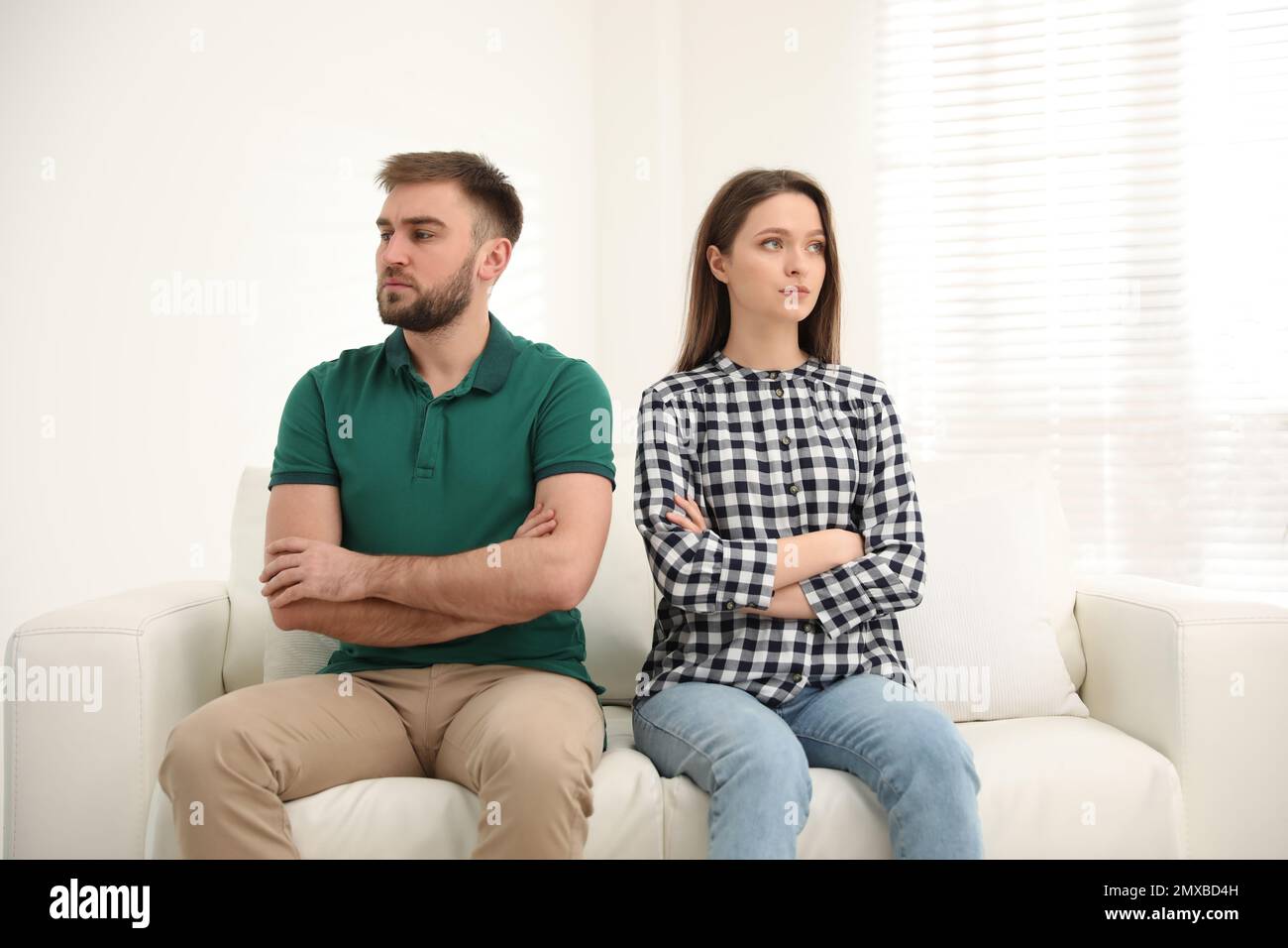 Stubborn man and woman with problems in relationship at home Stock Photo - Alamy