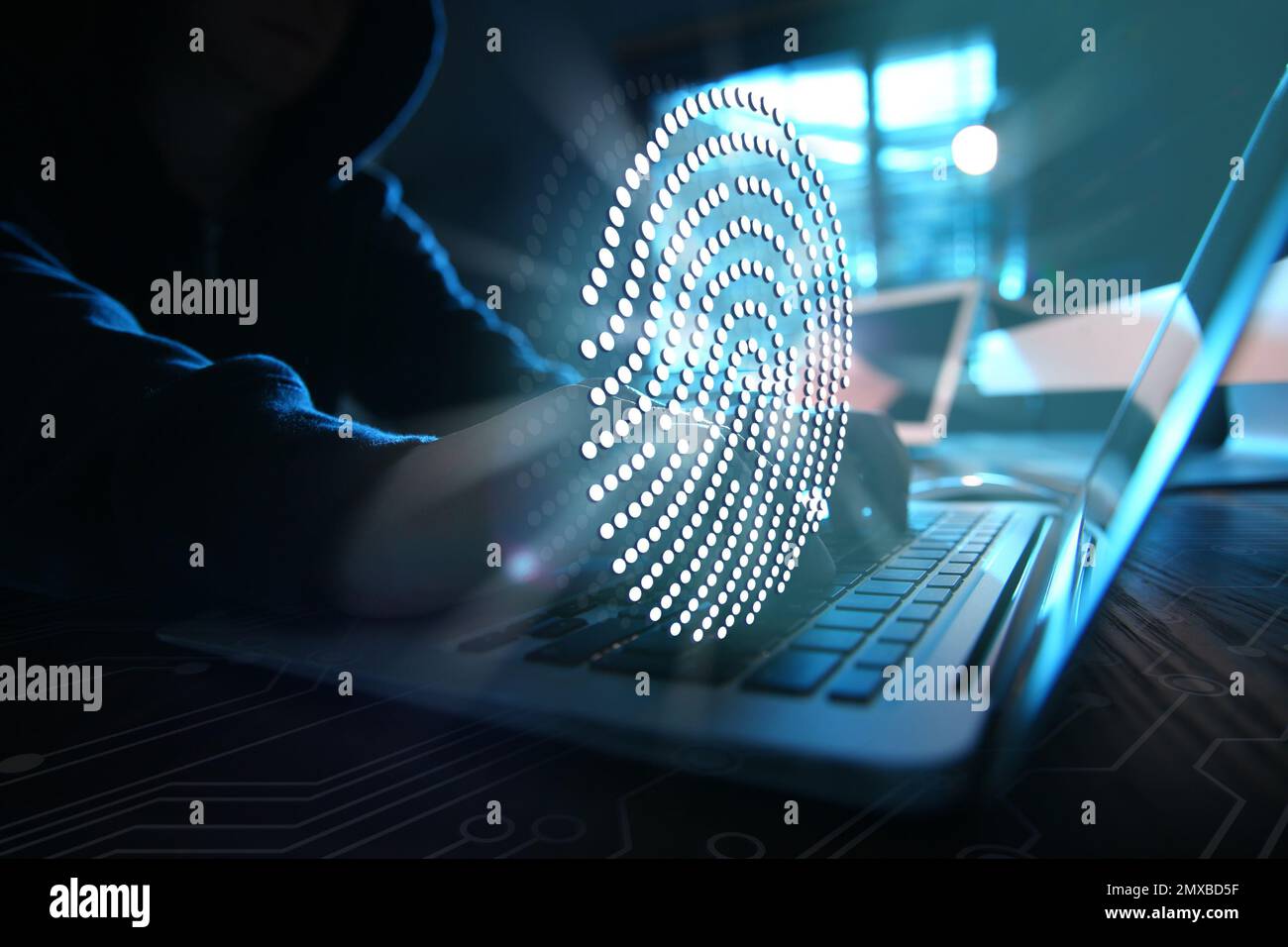 Fingerprint identification. Man working with laptop at table, closeup ...