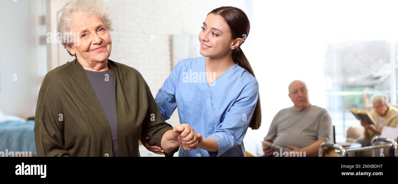 Nurse taking care of elderly woman in geriatric hospice. Banner design ...