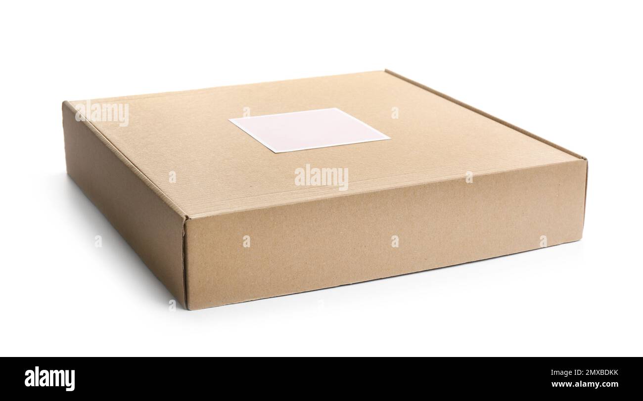 One closed cardboard box isolated on white Stock Photo - Alamy