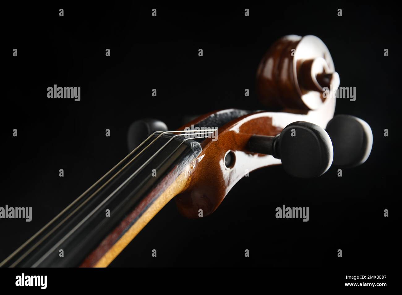 Beautiful violin on black background, closeup view Stock Photo - Alamy