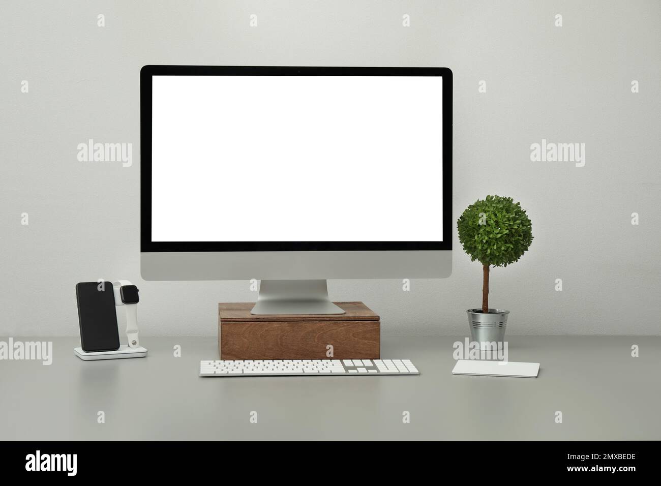 Modern workplace with computer and charging devices. Interior design ...