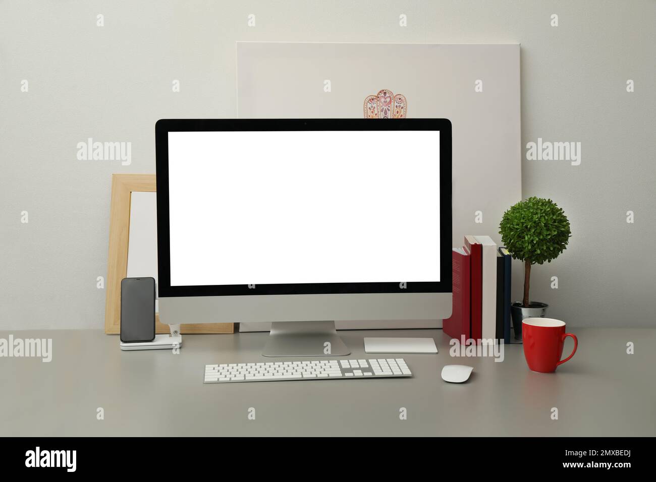 Modern workplace with computer and decor elements. Interior design ...