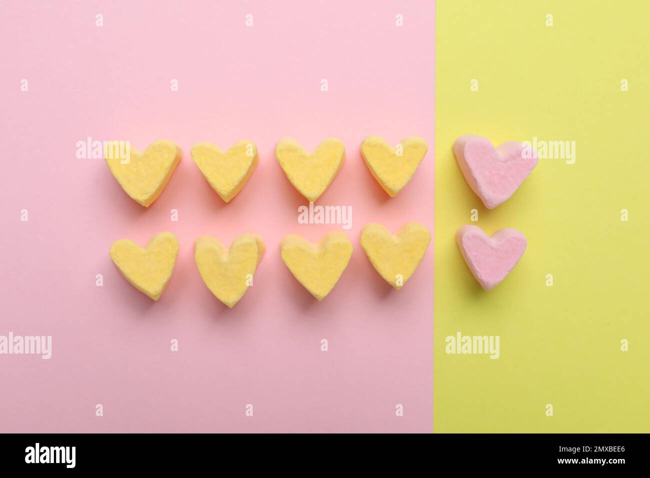 Flat lay composition with marshmallow hearts on color background ...