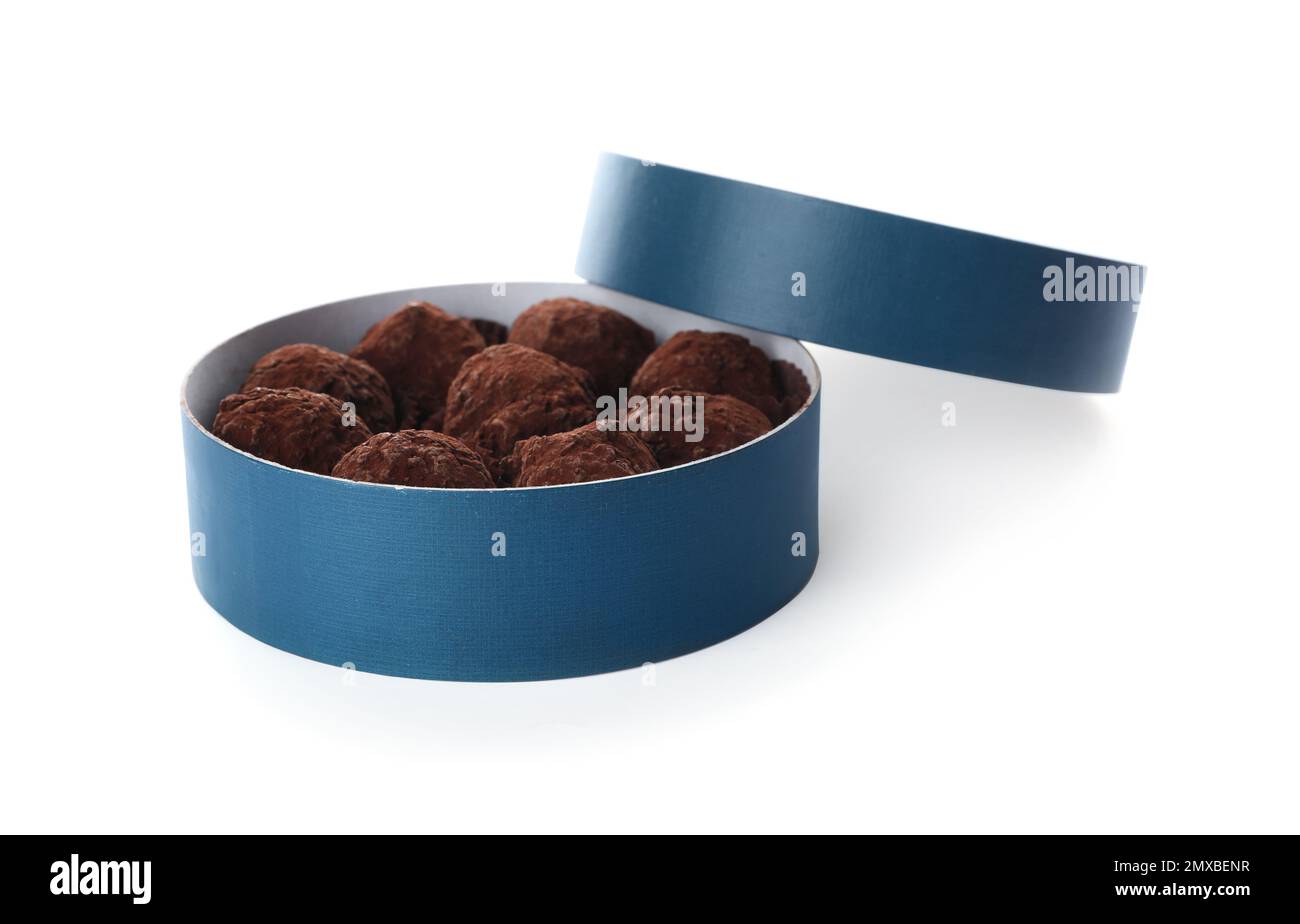 Box with tasty chocolate truffle candies isolated on white Stock Photo ...