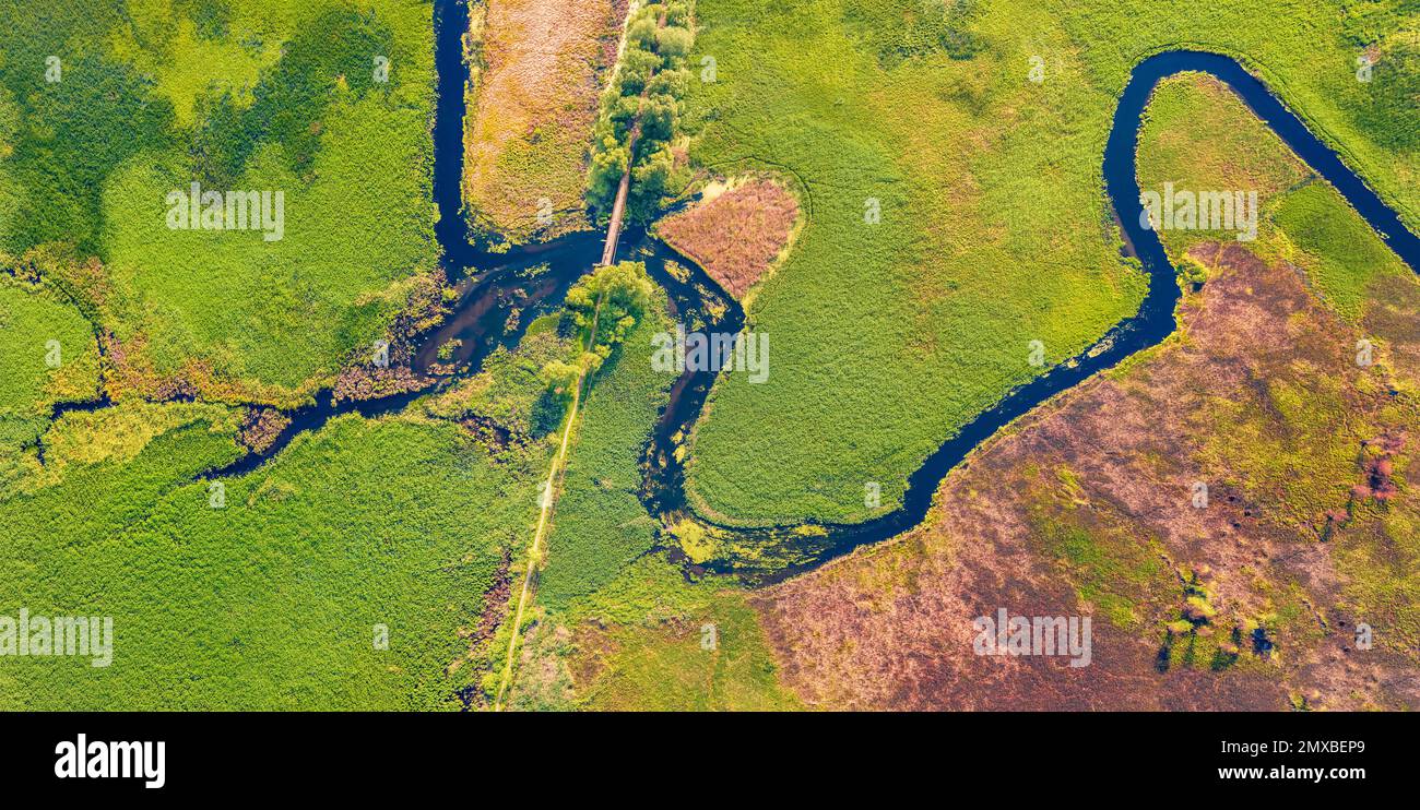 Straight dawn panoramic view from flying drone of bridge over Seret ...