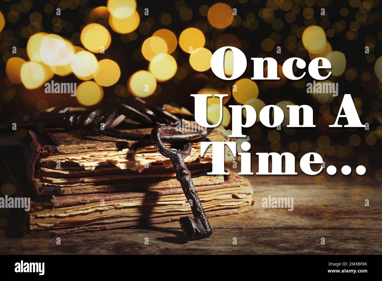 Bunch of vintage keys with old books and text Once upon a time. Fairy ...