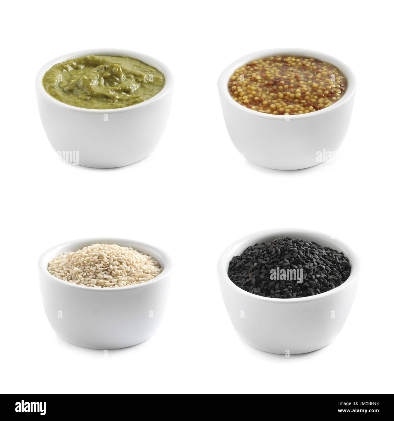 Set of different delicious sauces and condiments on white background ...